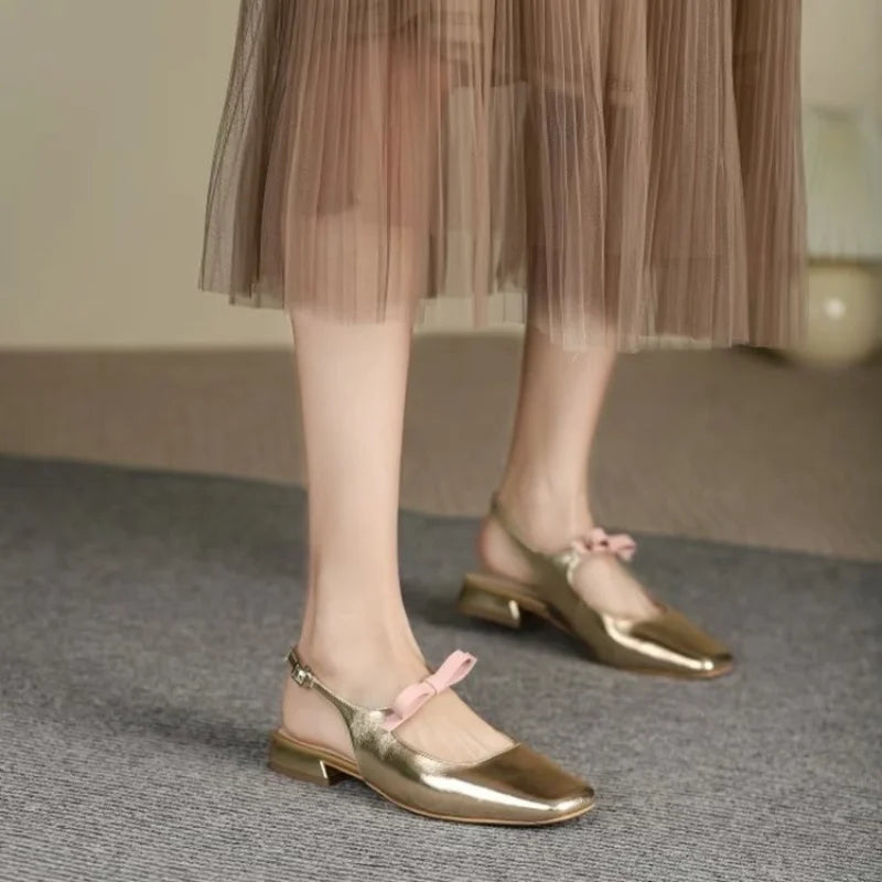 Metallic Gold Flats With Pink Bow Accent on Luulla
